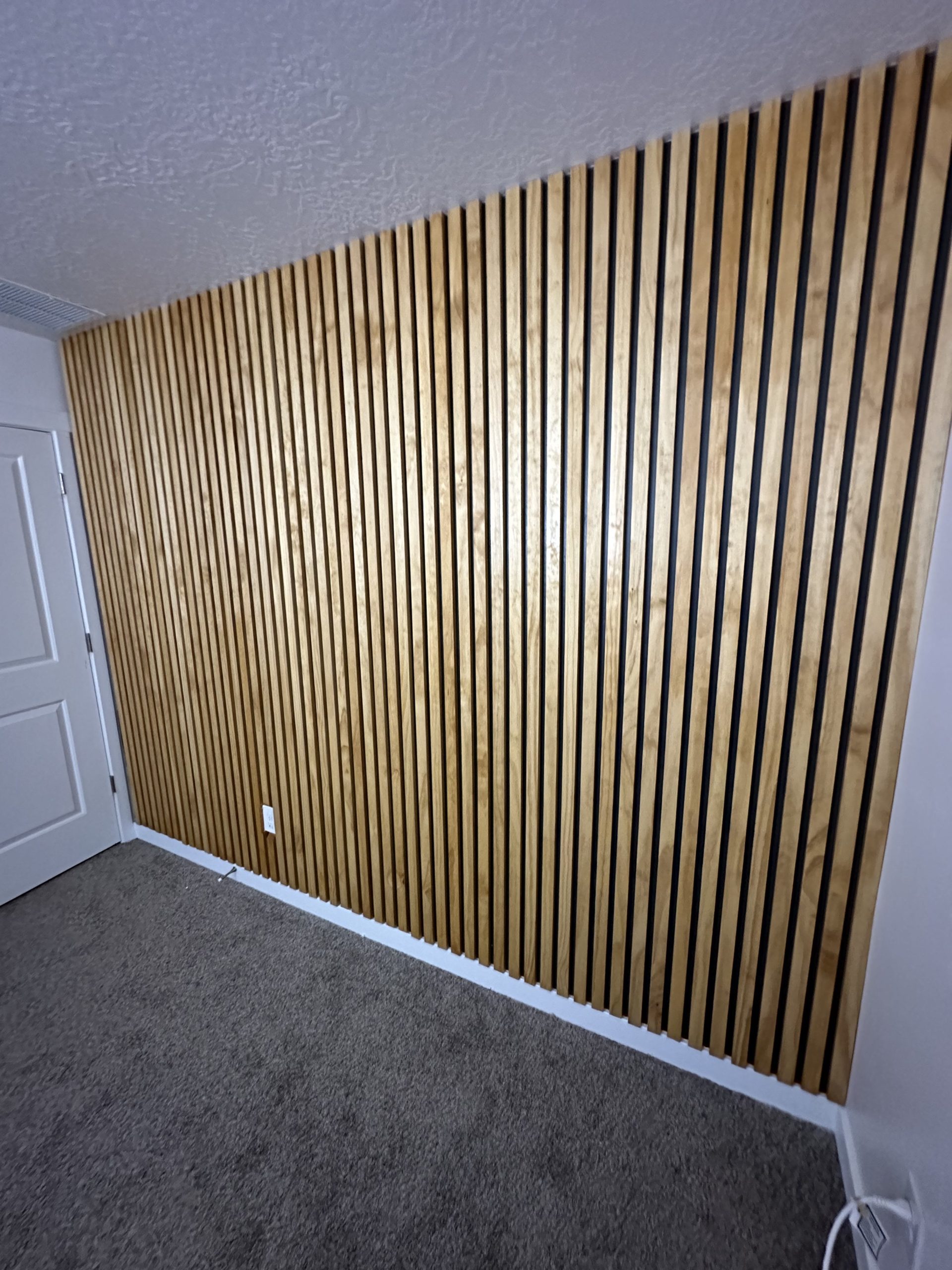 How to Build a Stunning DIY Wood Slat Wall - House To Home DIY